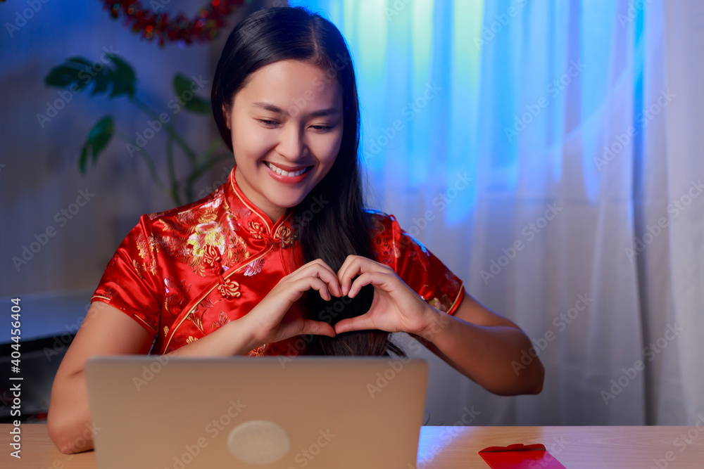 Young beauty happy Asian woman wearing Chinese tradition dress making ...