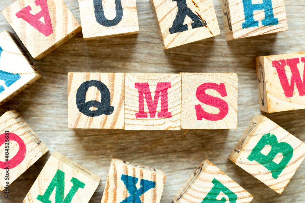 Alphabet letter block in word QMS (abbreviation of quality management ...