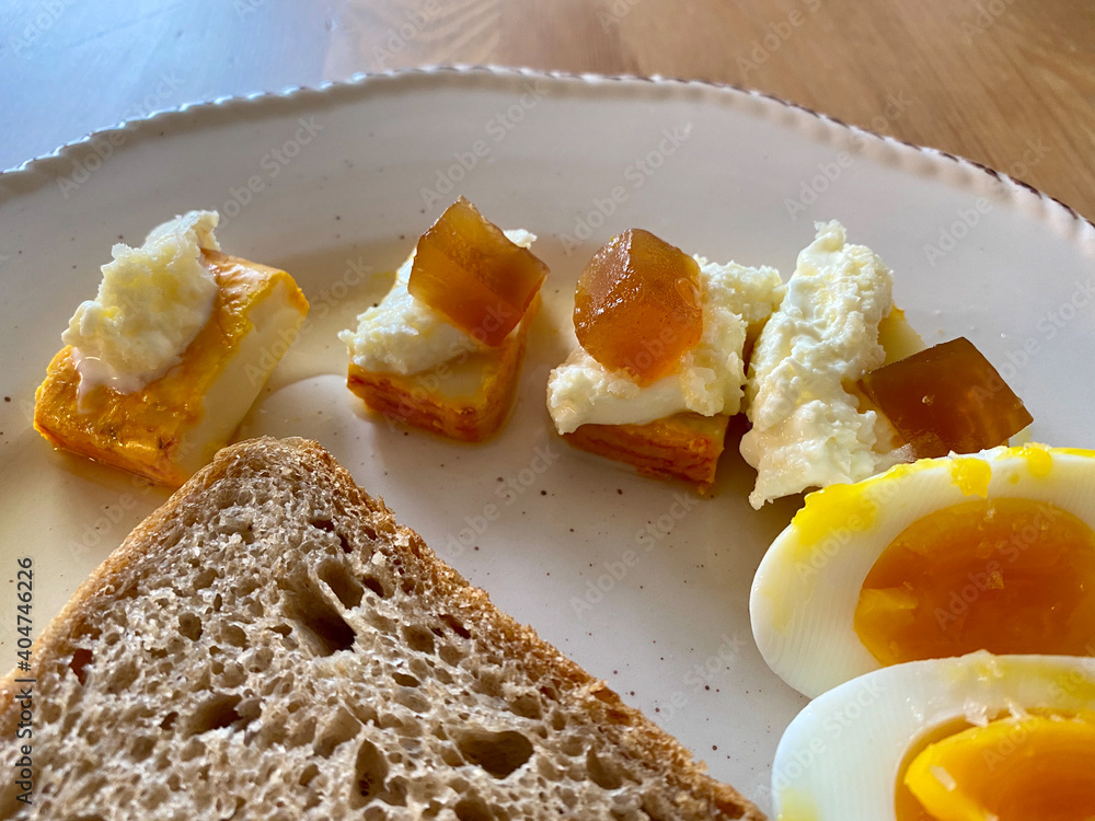 Homemade Breakfast Plate with Cubed Mature French Tomme Cheese Slices ...
