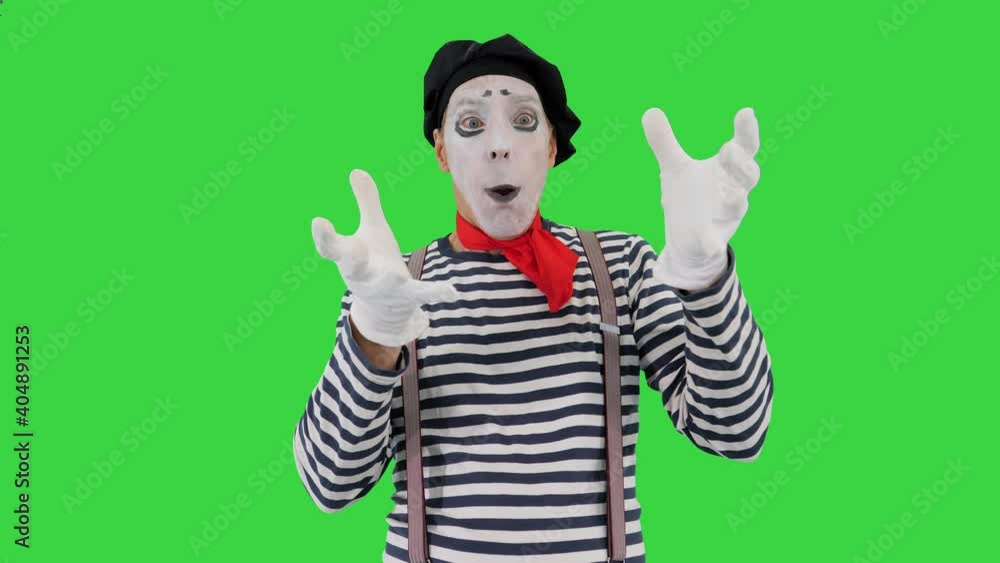 Mime artist blowing imaginary balloon on a Green Screen, Chroma Key ...