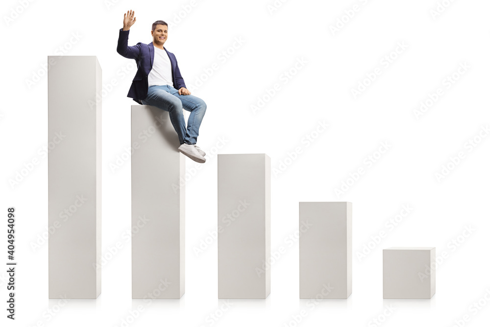 Man in jeans and suit sitting on a bar graph and waving at camera Stock ...