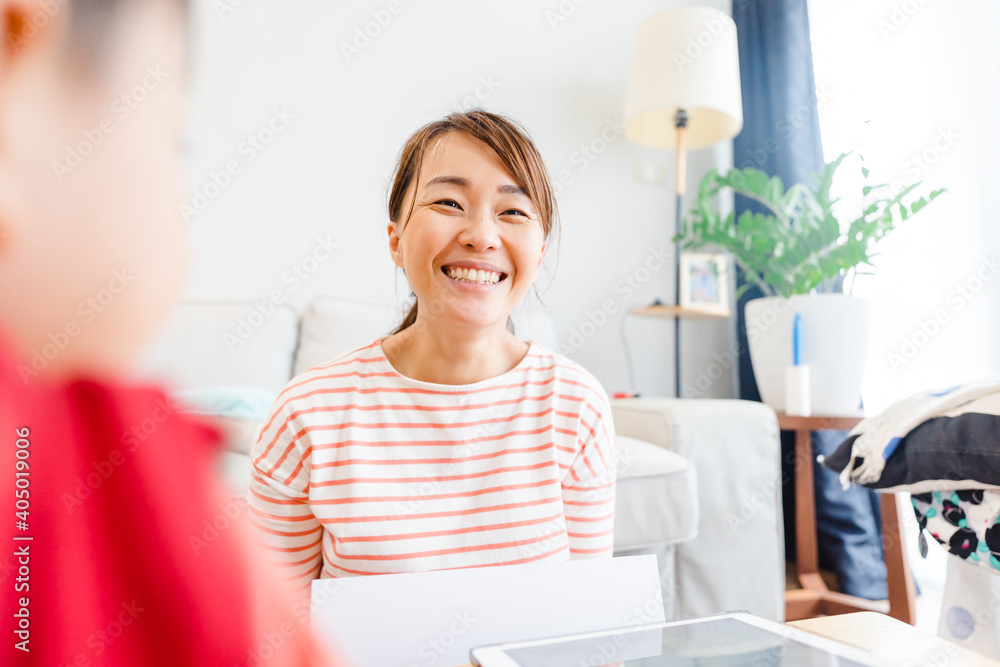 Happy family lockdown activity at home.Asian Mother and children are ...
