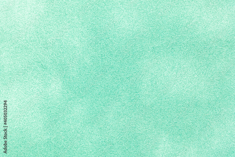 Light green matte background of suede fabric, closeup. Velvet texture ...