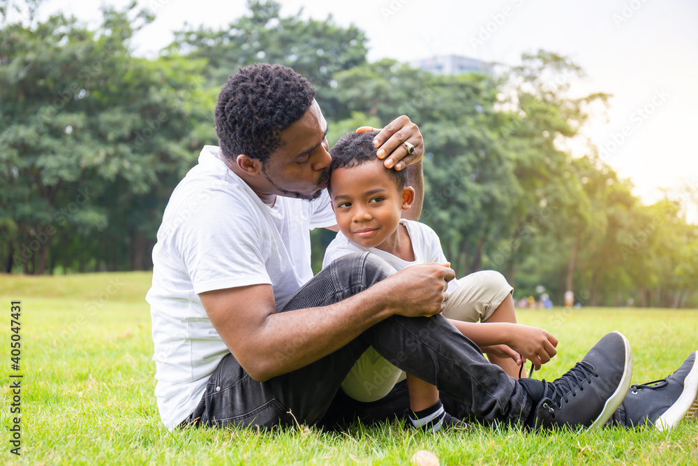 Happy African American Father While Hug And Carry His Son Dad Was