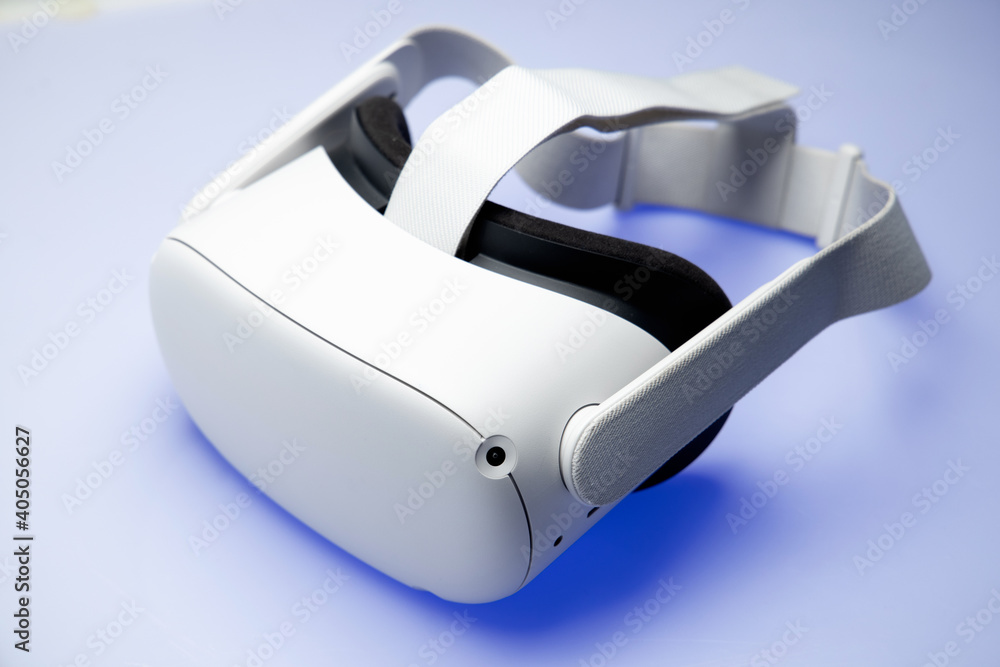 White new generation VR headset isolated on white background with blue ...