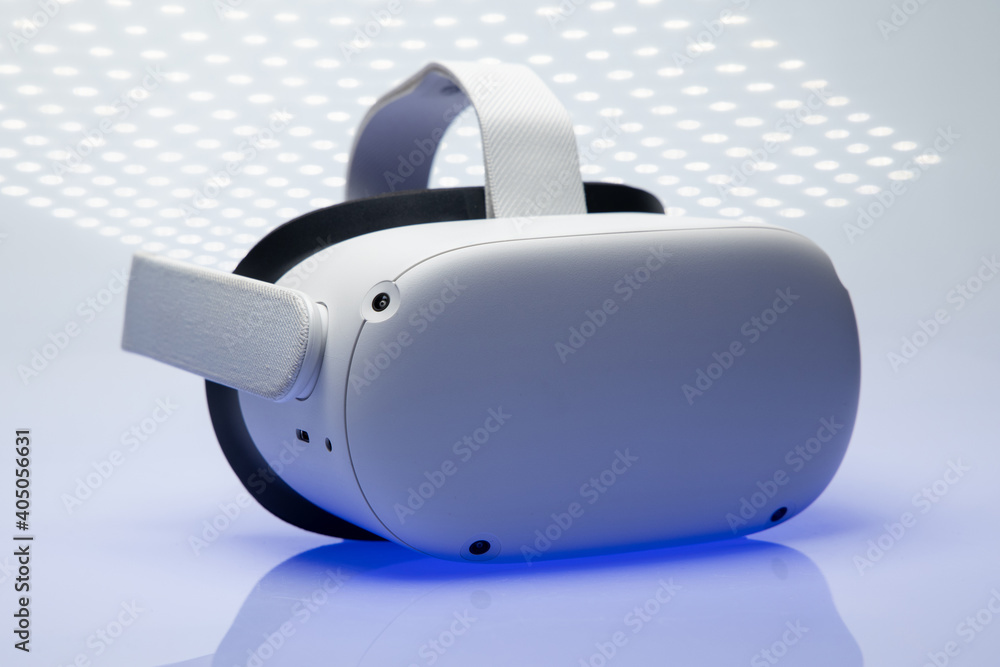 White new generation VR headset isolated on white background with blue ...