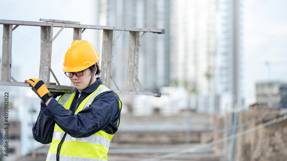 Asian maintenance worker man with safety helmet and reflective suit ...