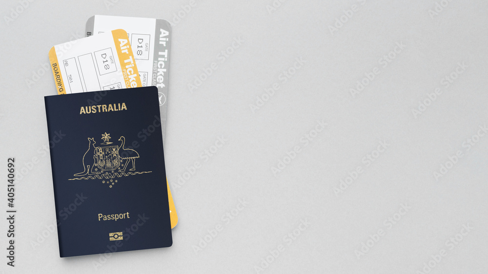 Australian passport with a boarding pass inside , white background ...