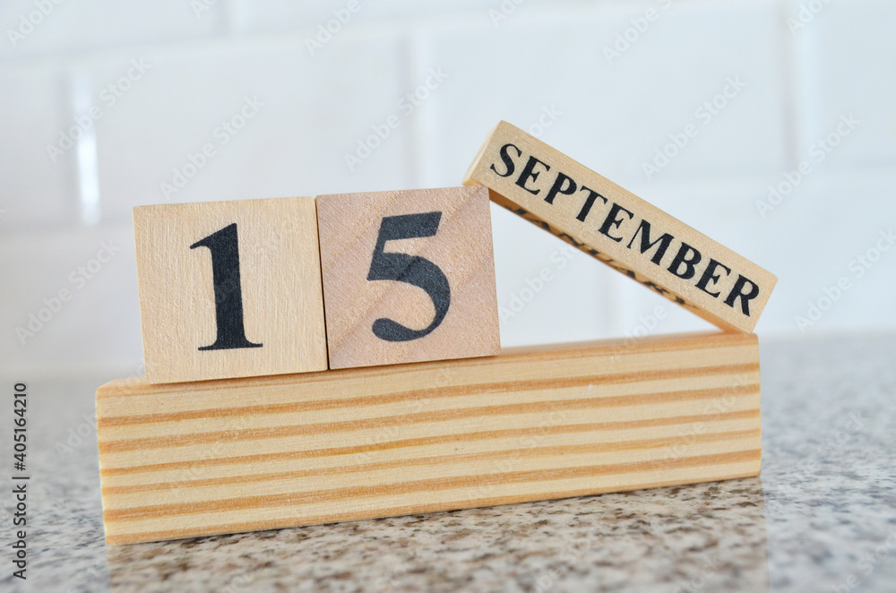 September 15, Cover design with number cube on a white background and ...