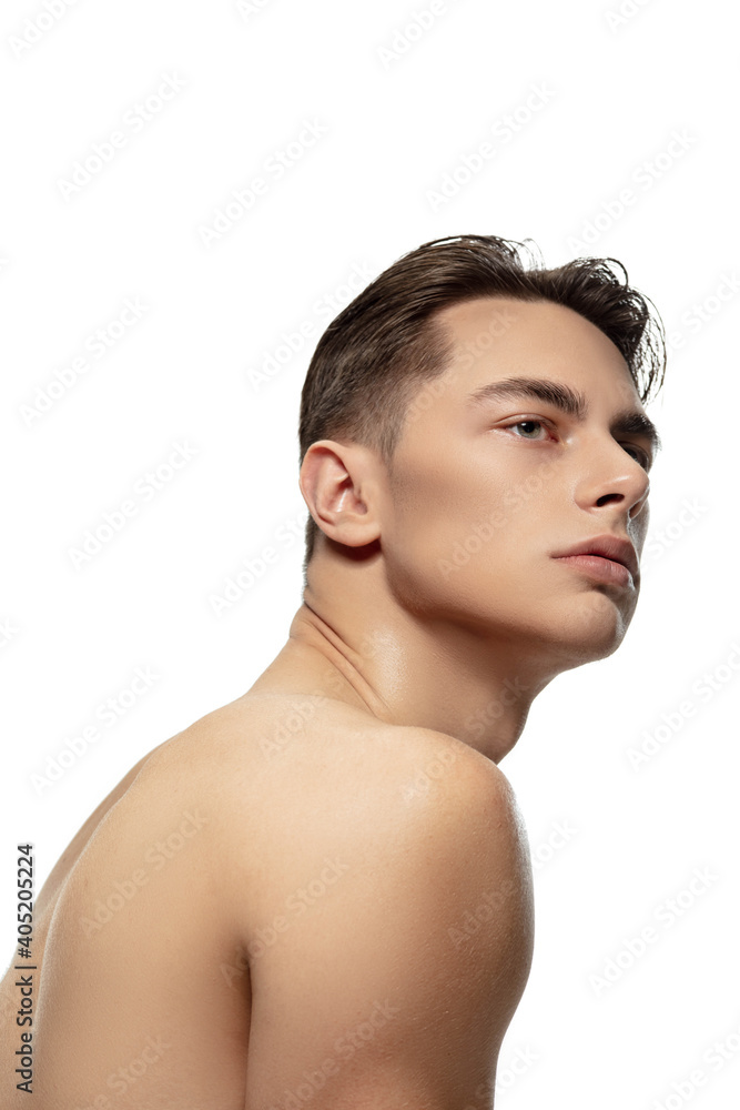 Muscular. Portrait of young man isolated on white studio background ...