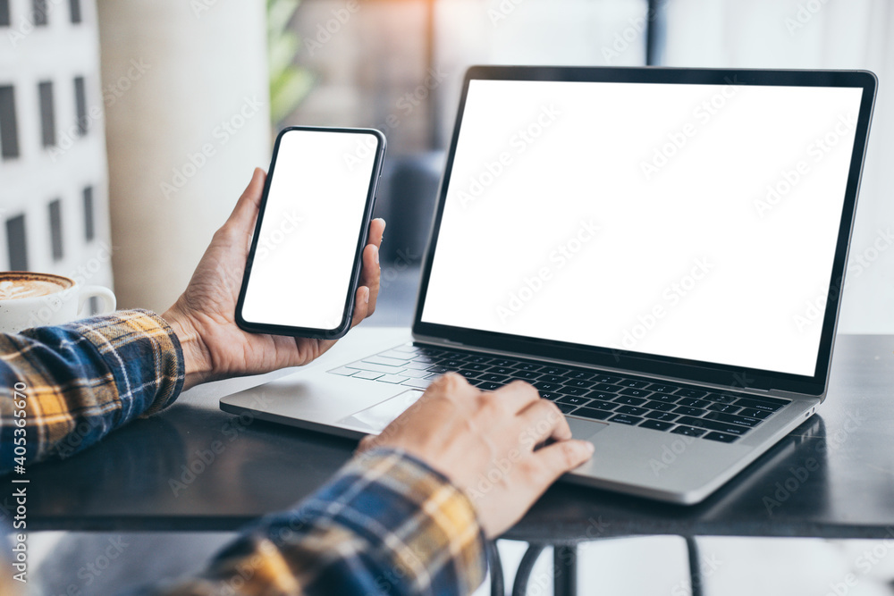 computer screen,cell phone blank mockup.hand woman work using laptop ...