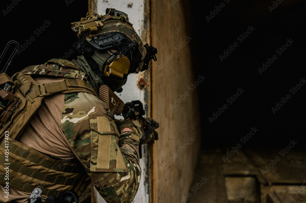 Special forces soldier doing tactical training in building clearing ...
