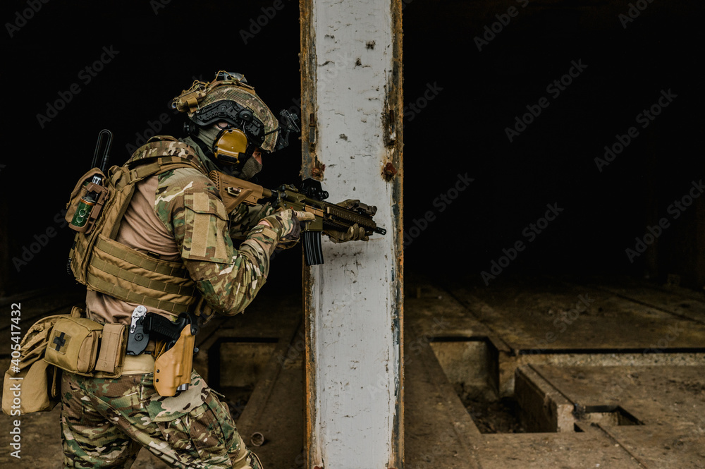 Special forces soldier doing tactical training in building clearing ...