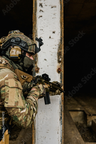 Special forces soldier doing tactical training in building clearing ...