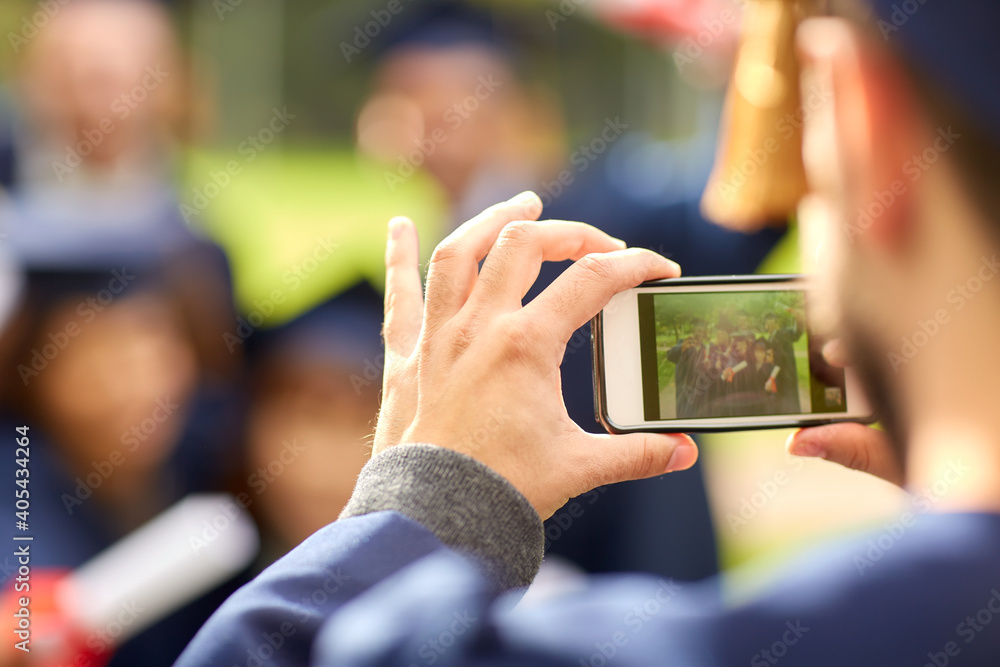 education, graduation, technology and people concept - group of happy ...