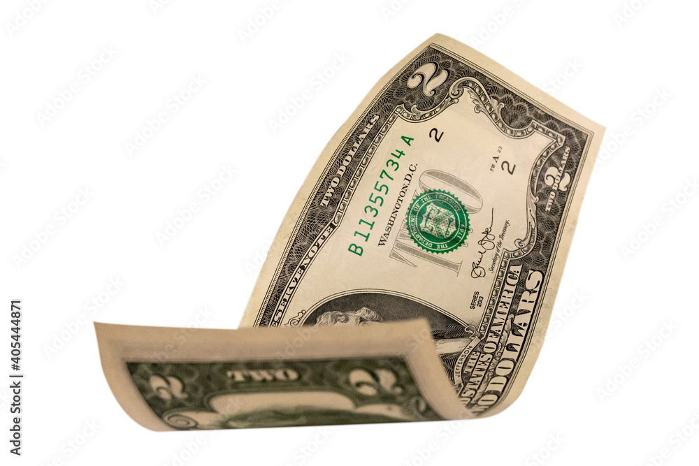 Two dollars isolated on a white background. Notes in denomination of ...