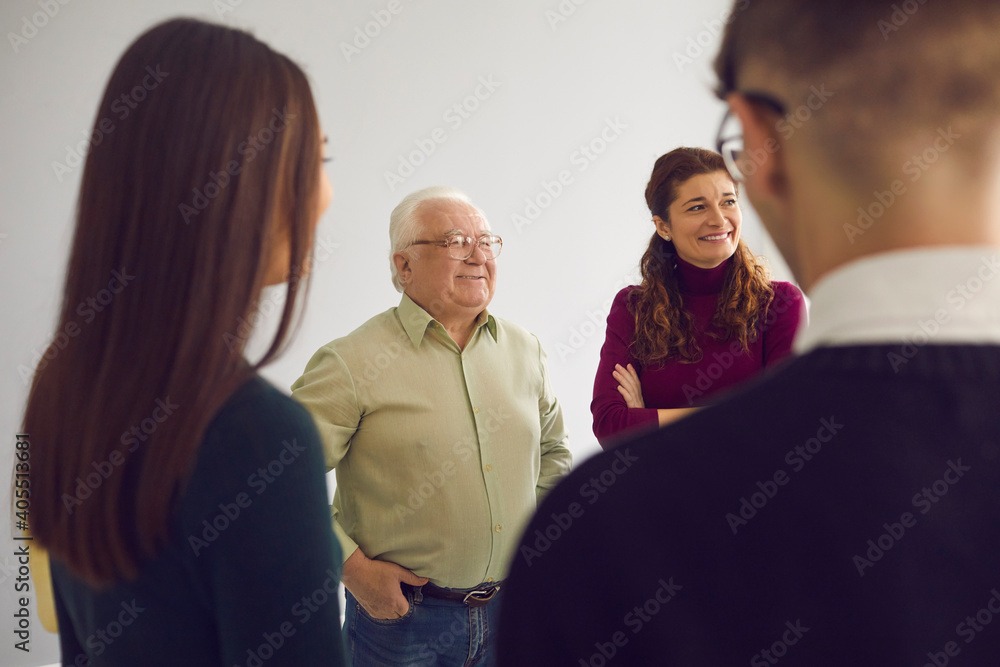 Foto de People of different ages gathering together and talking. Happy ...