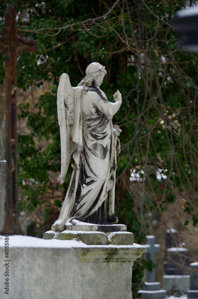 Tombstones and graves, family crypts and vaults on graveyard or ...