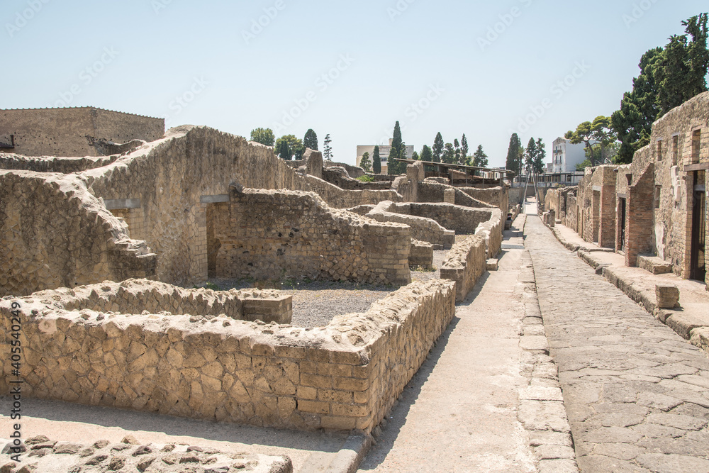 Ancient roman street in Ercolano - Herculaneum, ancient Roman town destroyed by the eruption of ...