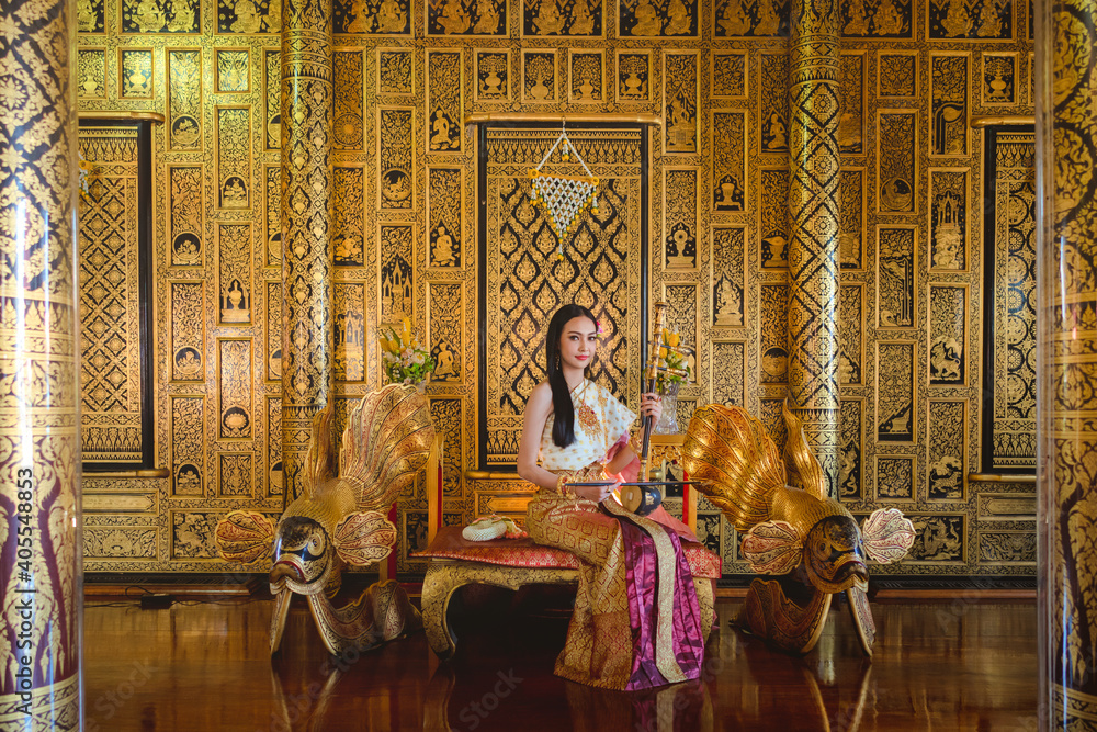 Luxury portrait of a beautiful Thai girl in traditional thai costume ...