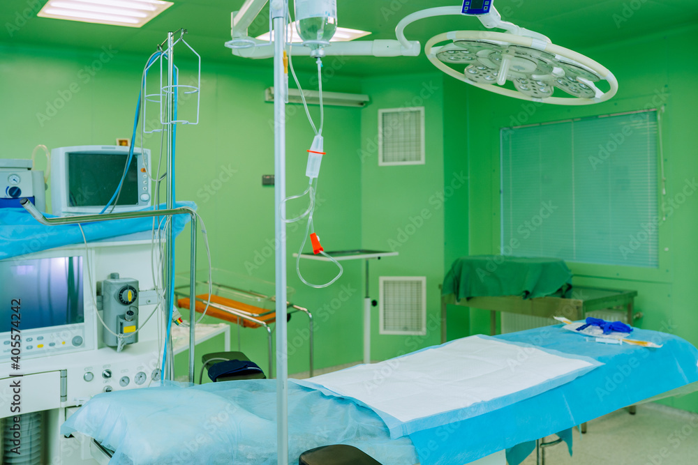 Interior of operating theatre with green walls for birthing of pregnant ...