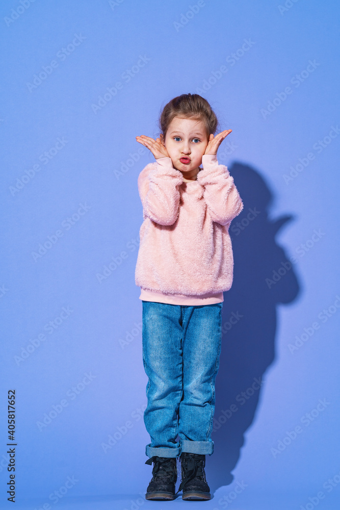 Wow surprised child girl screams with open mouth and crazy facial ...