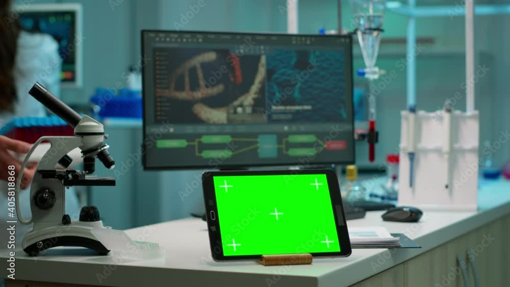 Display tablet with green screen, mock up on template placed on desk in ...