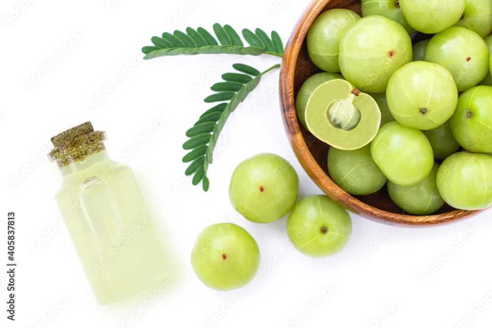 indian gooseberry with amla extract essential oil isolated on white ...