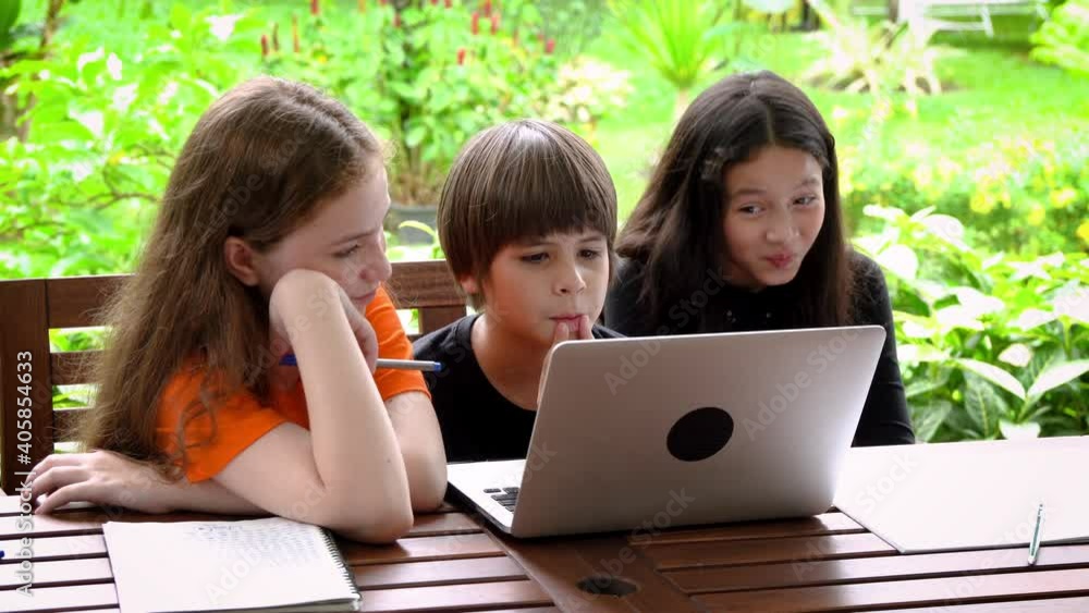 Children, boy and girl, using laptop computer for online learning in ...