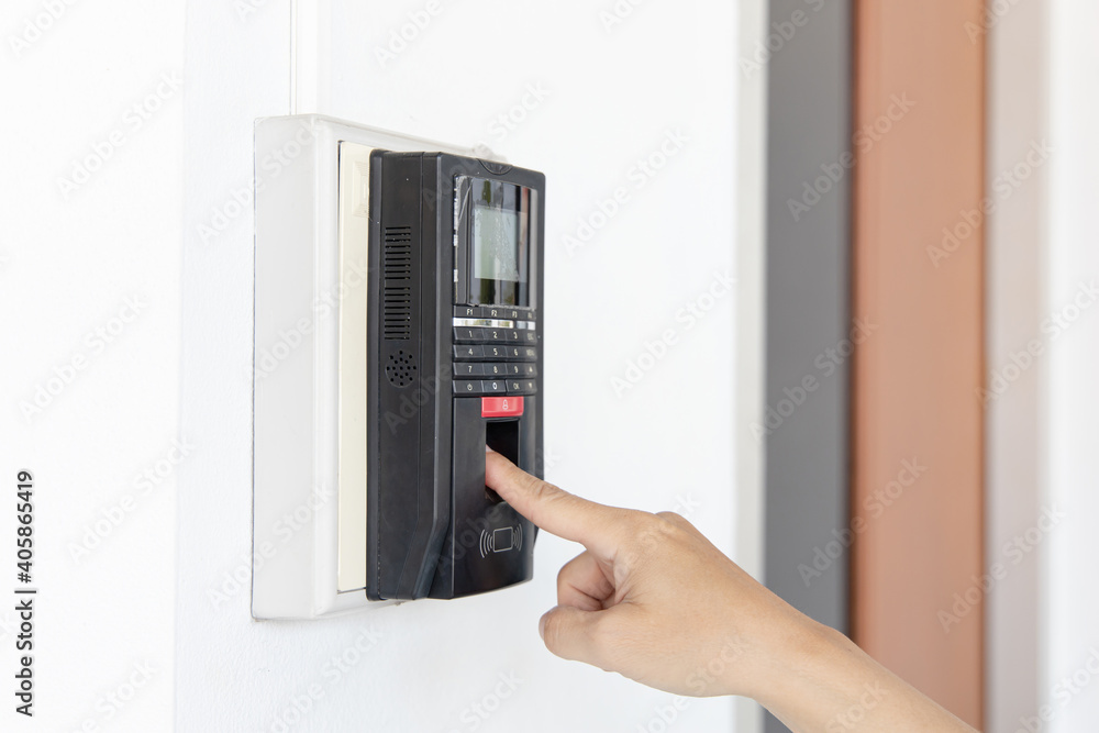 Finger print scan, Male employees press sensors to record company ...