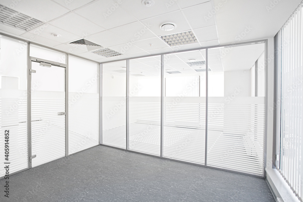 Empty office room with glass walls, door and glass window Stock Photo ...