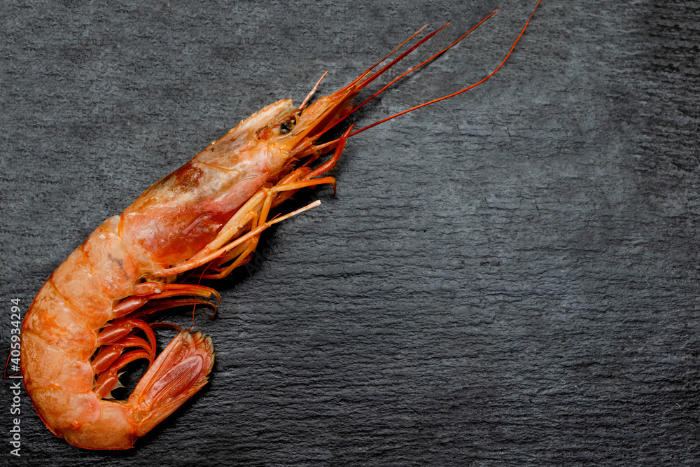 Raw big fresh prawn, shrimp on black desk, background with copy space ...