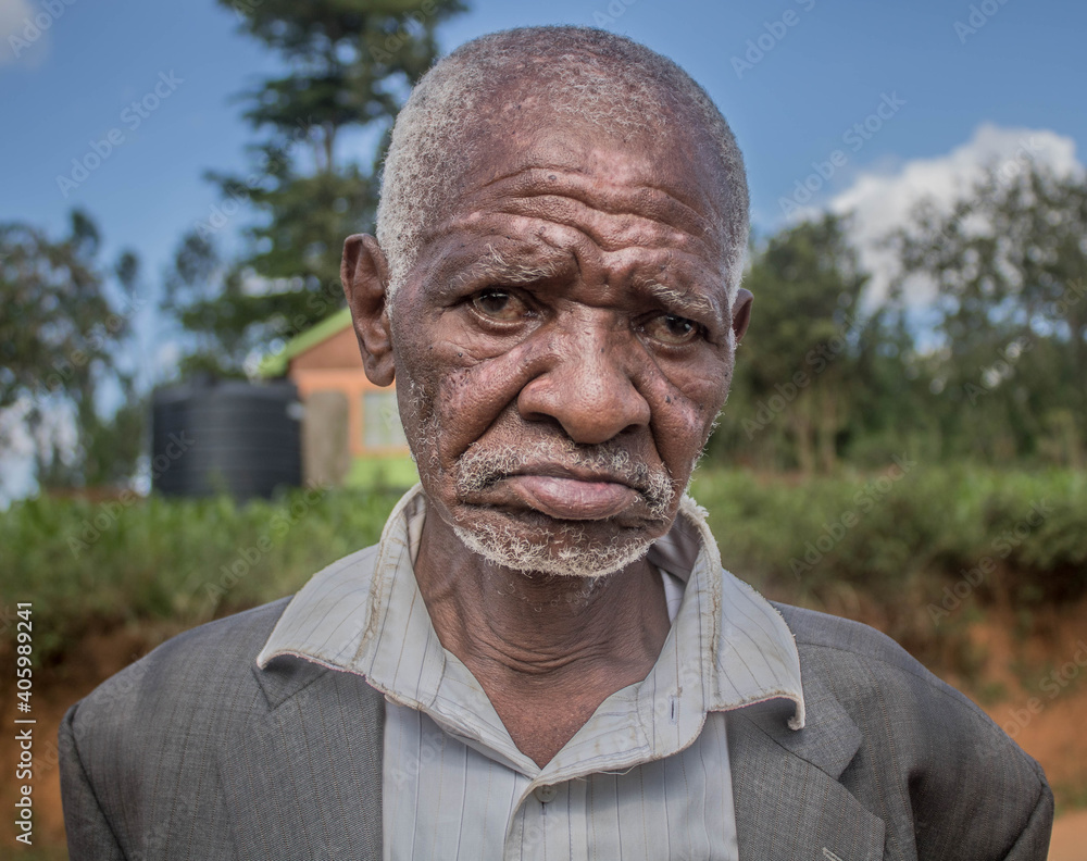 Portrait Of Senor Man Standing Outdoors Stock Photo | Adobe Stock