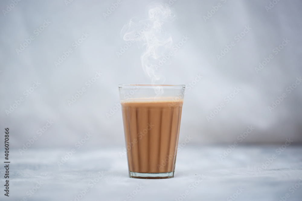 Fresh milk tea or Indian Kadak Chai. Stock Photo | Adobe Stock