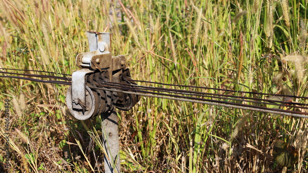 Wire harness for rail switch control. Sling line on a rail beside a ...