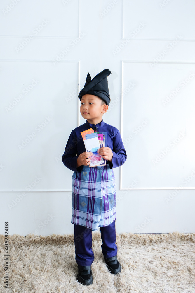 Fotografia do Stock: Muslim Boy With Exciting Facial Expression When ...