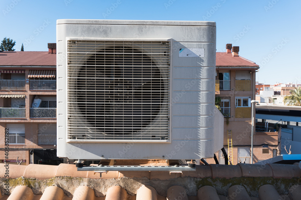 air conditioning machine on the roof of the house. Rooftop air ...