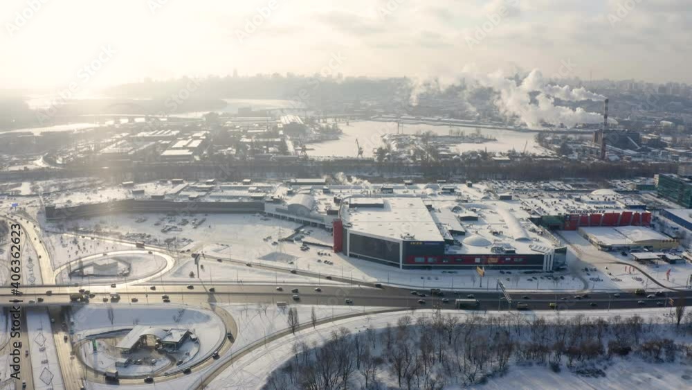 buildings with metal carcasses and flat roofs at snowy construction ...