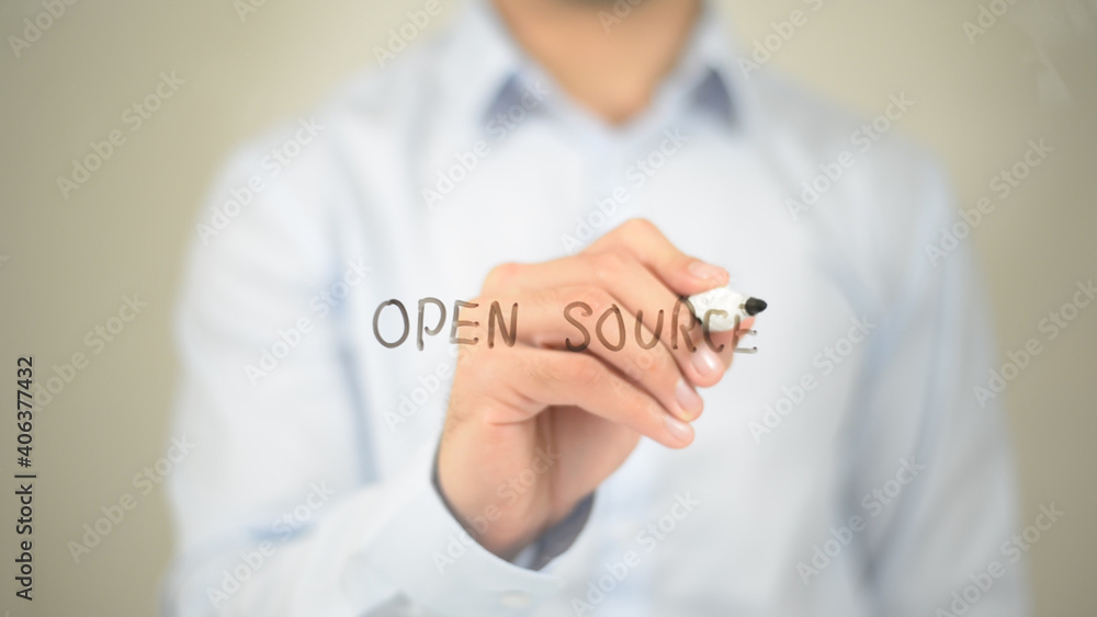 Open Source , Man writing on transparent screen Stock Photo | Adobe Stock