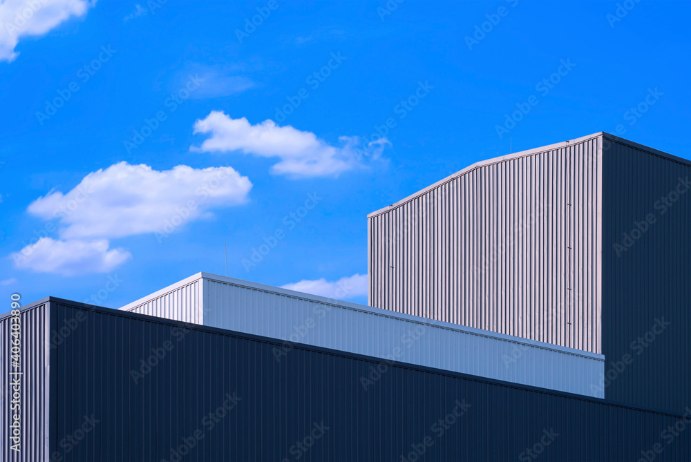 Low angle and perspective side view of corrugated metal factory ...
