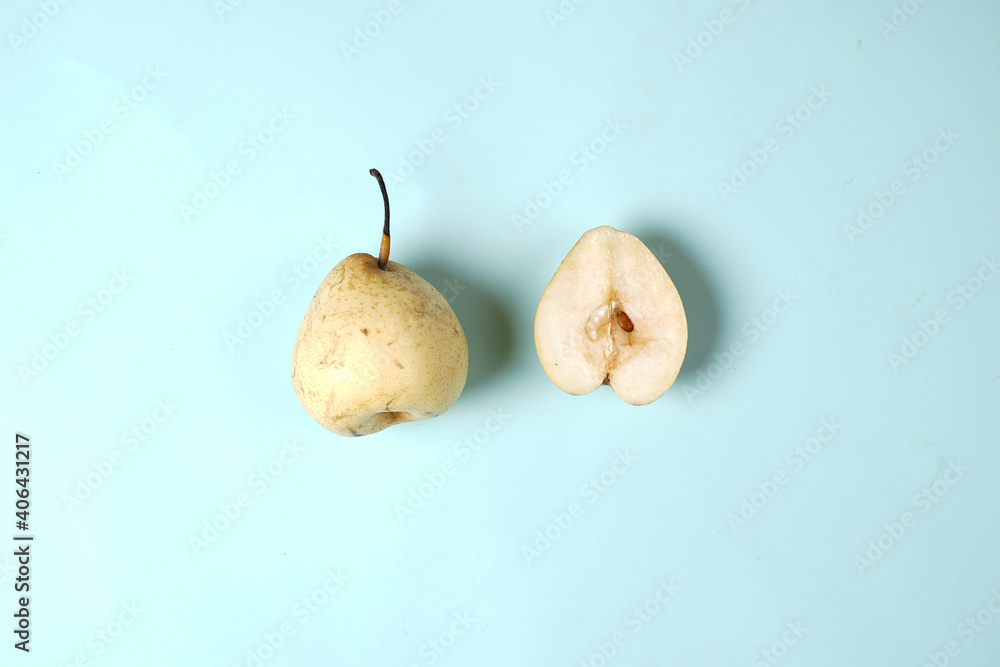 Fresh pear set, isolated whole and sliced. From the top view as a ...