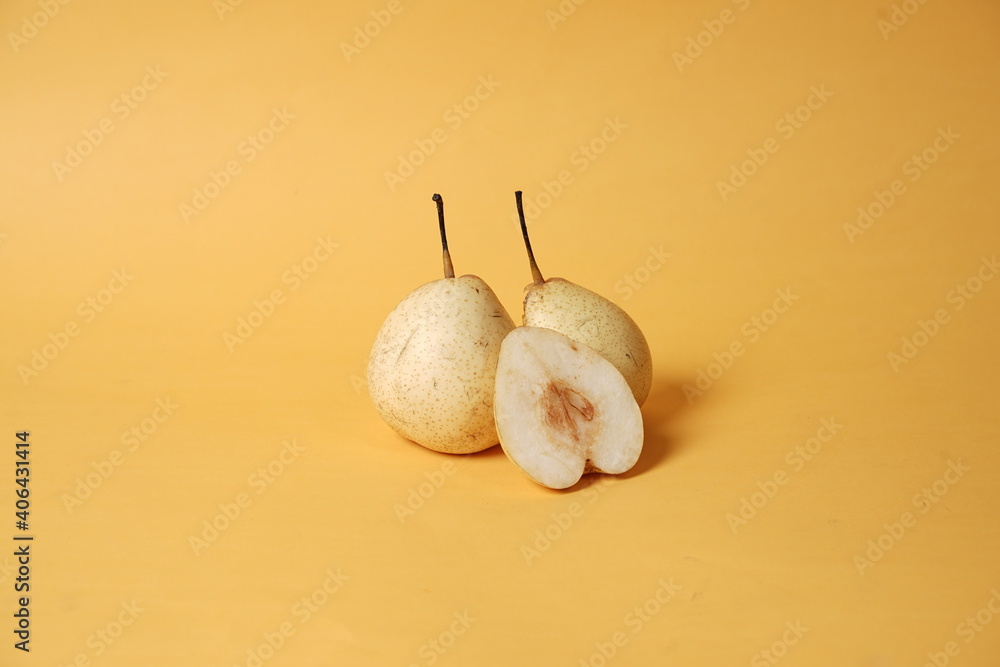 Fresh pear set, isolated whole and sliced. From the top view as a ...