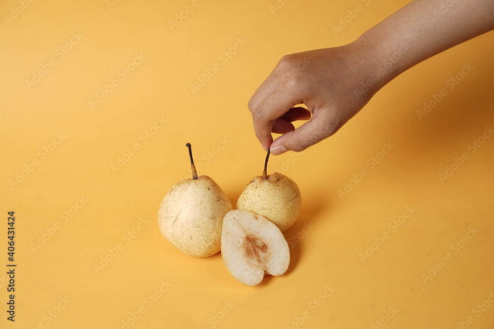 Fresh pear set, isolated whole and sliced. From the top view as a ...