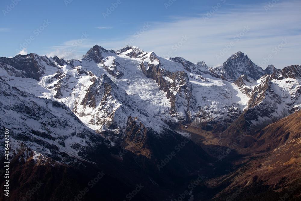 High Mountain Range with Snow-covered Peaks and a Mountain Gorge. The ...