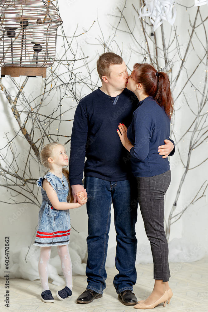 Happy family with cute little daughter, at home together, cheerful ...