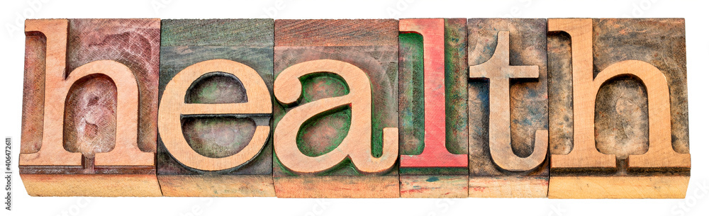 health - isolated word in letterpress wood type, wellness and well ...