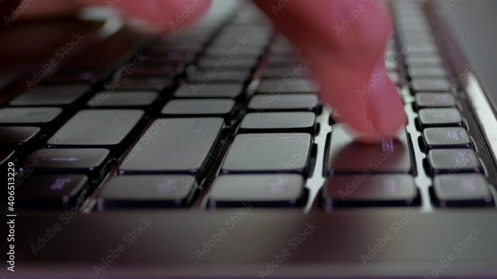 Press the buttons on the laptop keyboard. Work on computer. Type text ...