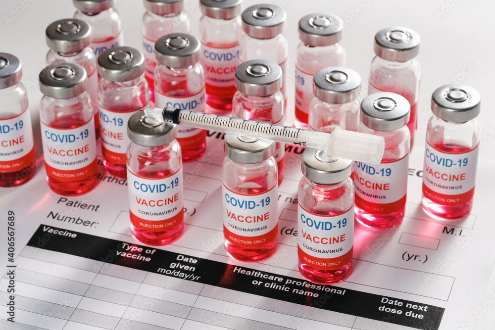 Many vaccine glass bottles for vaccination against COVID-19 SARS-CoV-2 ...