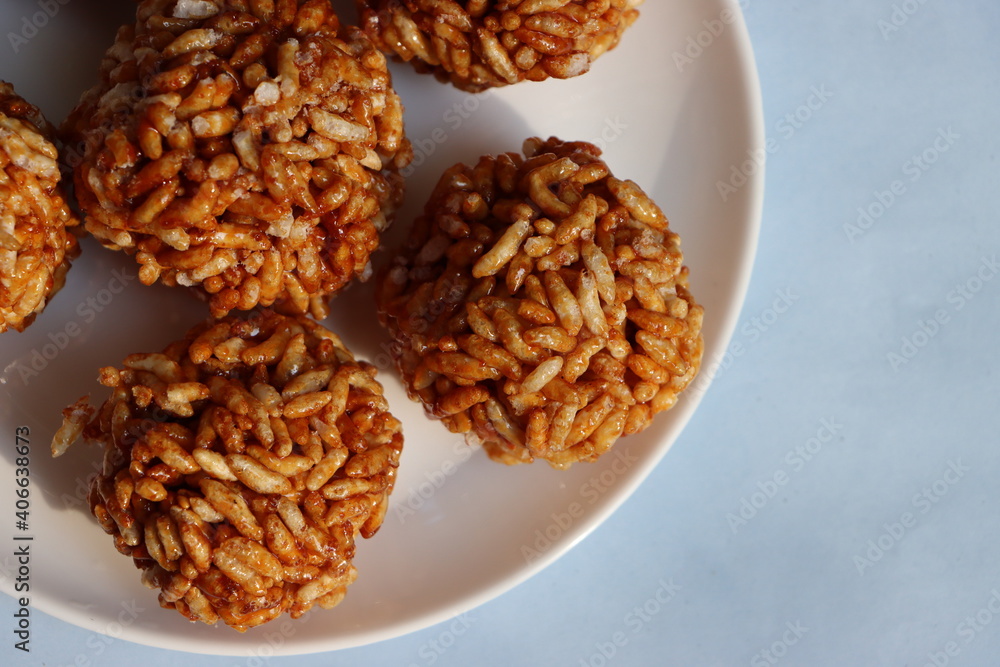 Indian Traditional Puffed Rice Balls is a sweet made using puffed rice ...