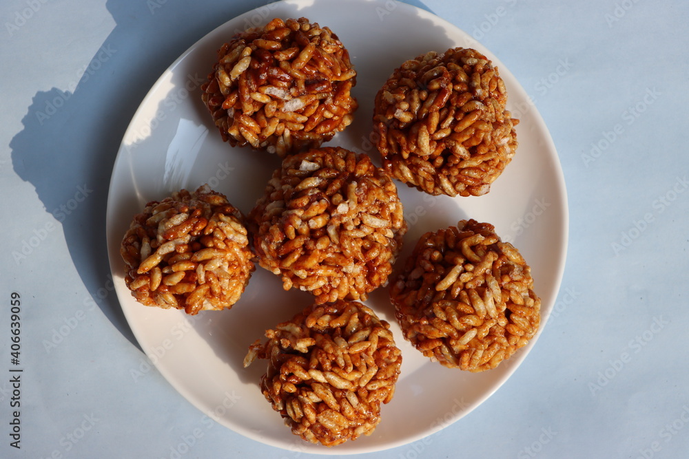 Indian Traditional Puffed Rice Balls is a sweet made using puffed rice ...